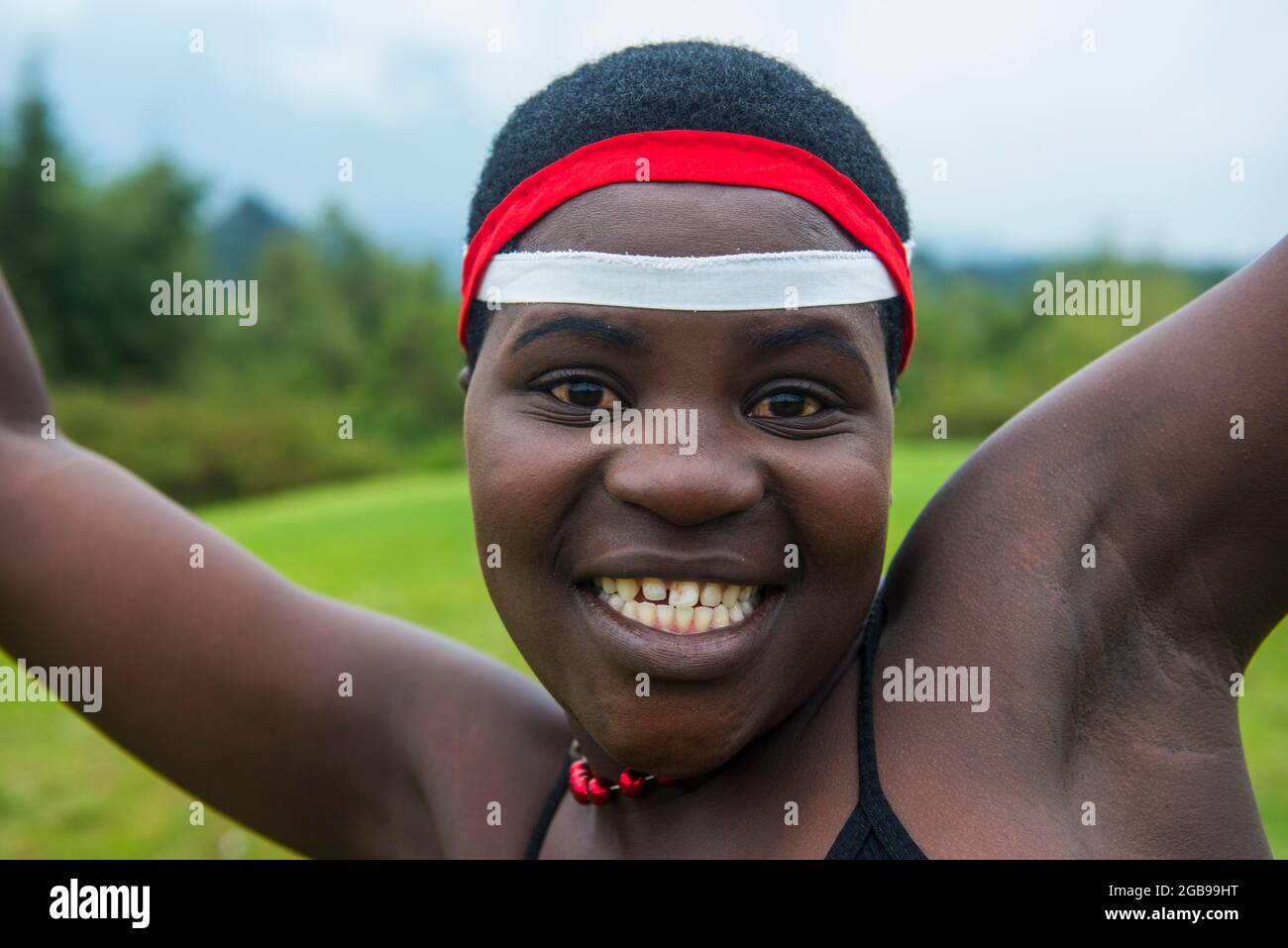 Woman starring at the camera at a ceremony of former poachers, in the ...