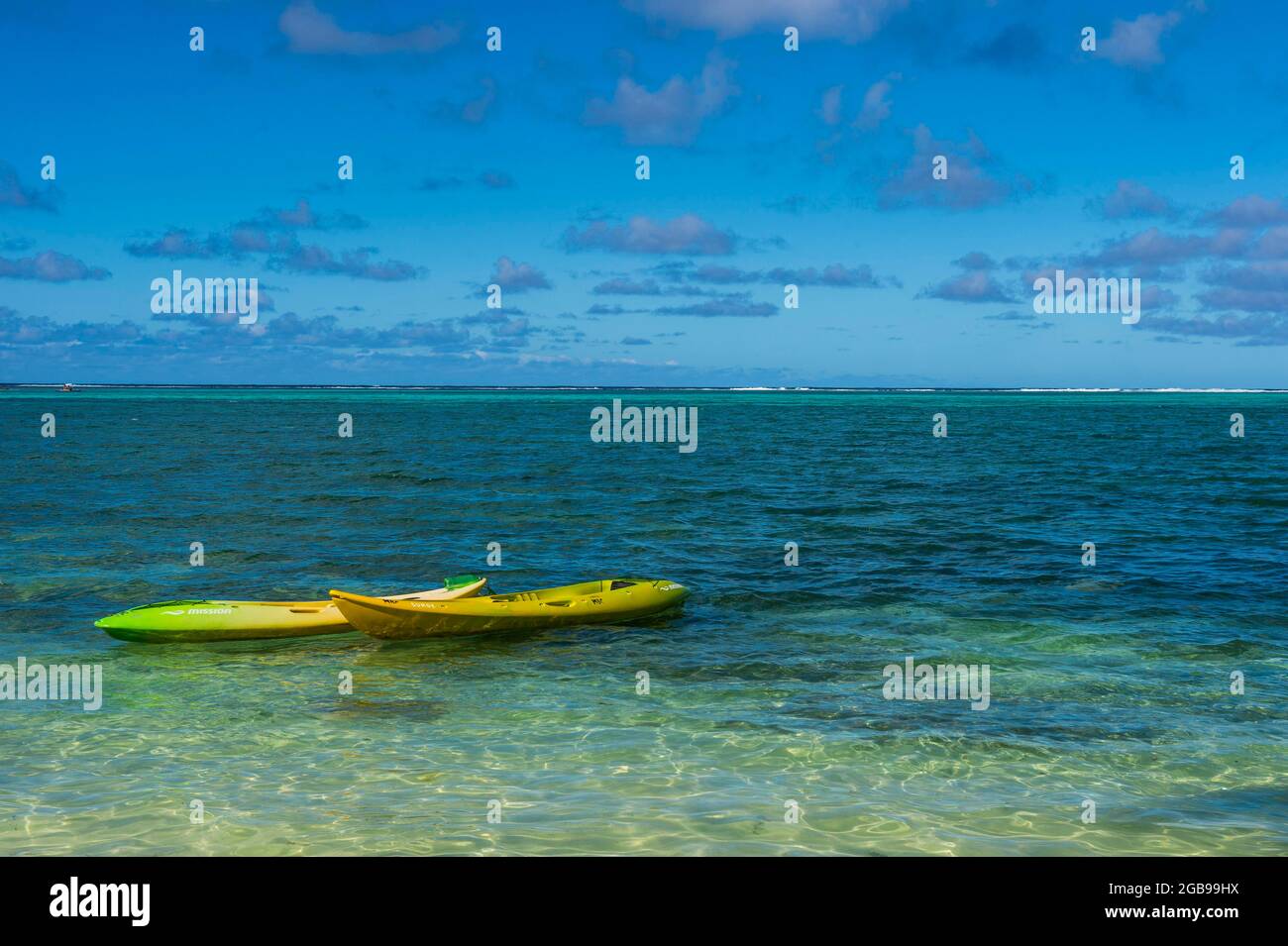 Kayaks in the wateres of Muri beach, Rarotonga, Rarotonga and the Cook ...