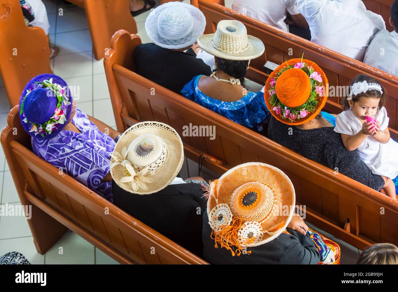 Women with traditional hats on a church service, Rarotonga, Rarotonga ...