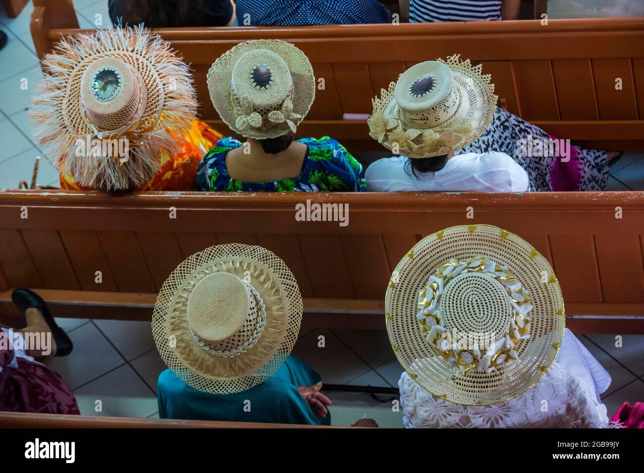 Women with traditional hats on a church service, Rarotonga, Rarotonga ...