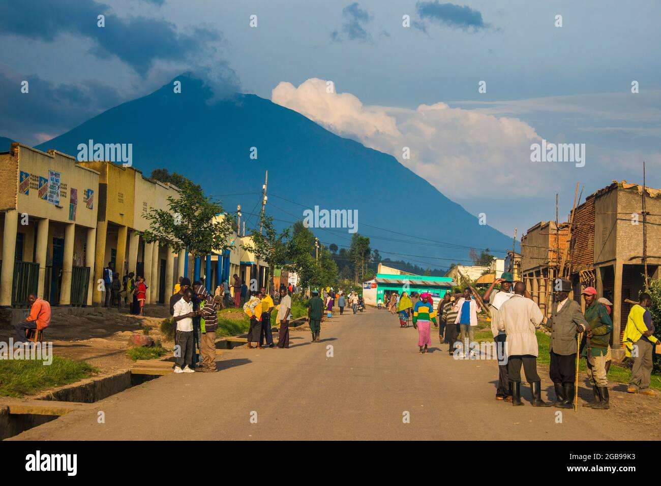 Little village before the towering volcanos of the Virunga National ...