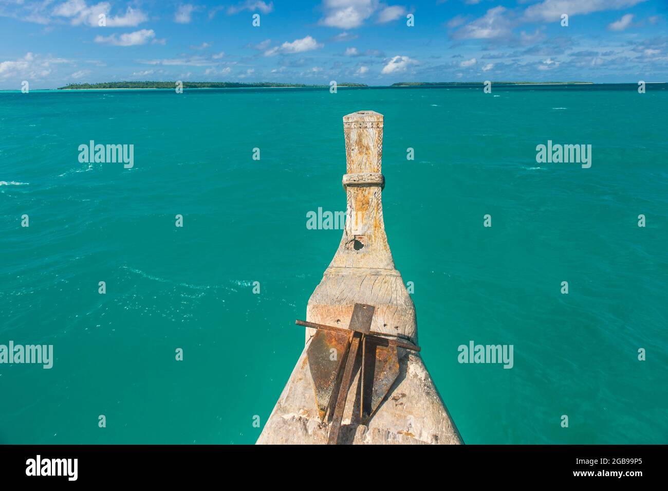 Traditional wood carved boat in the Aitutaki lagoon, Rarotonga and the ...