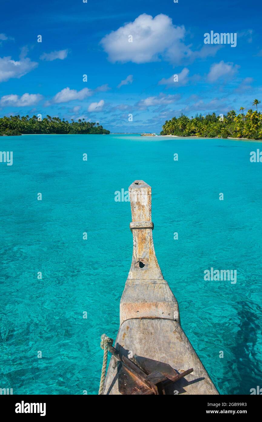 Traditional wood carved boat in the Aitutaki lagoon, Rarotonga and the ...