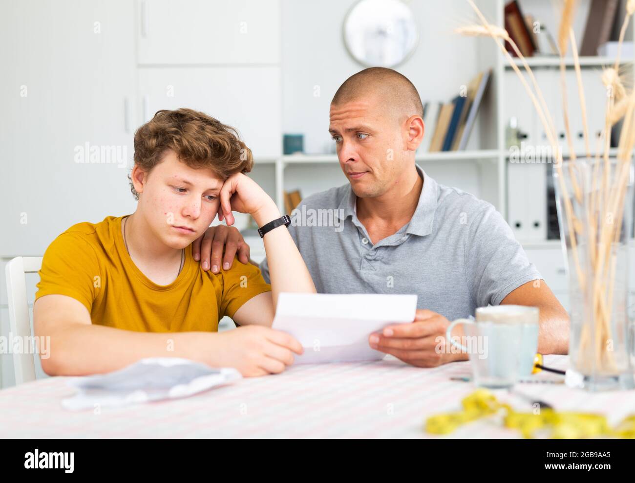 Father and son have recieved letter Stock Photo - Alamy
