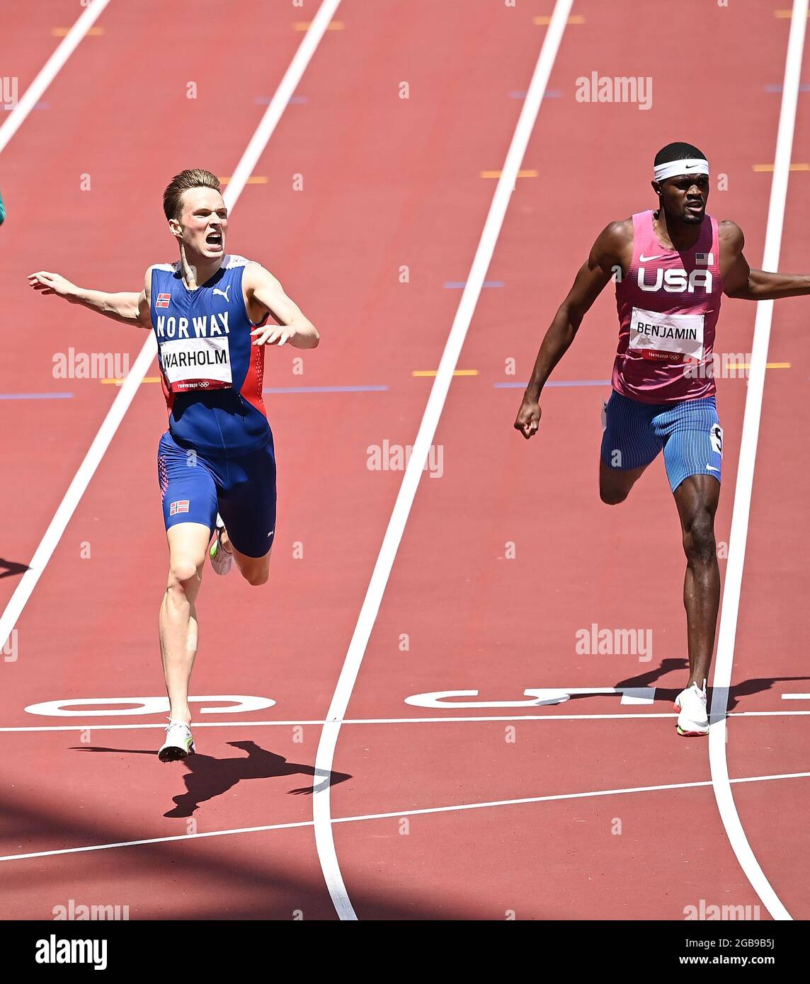 Tokyo, Japan. 3rd Aug, 2021. Karsten Warholm (L) of Norway and Rai ...