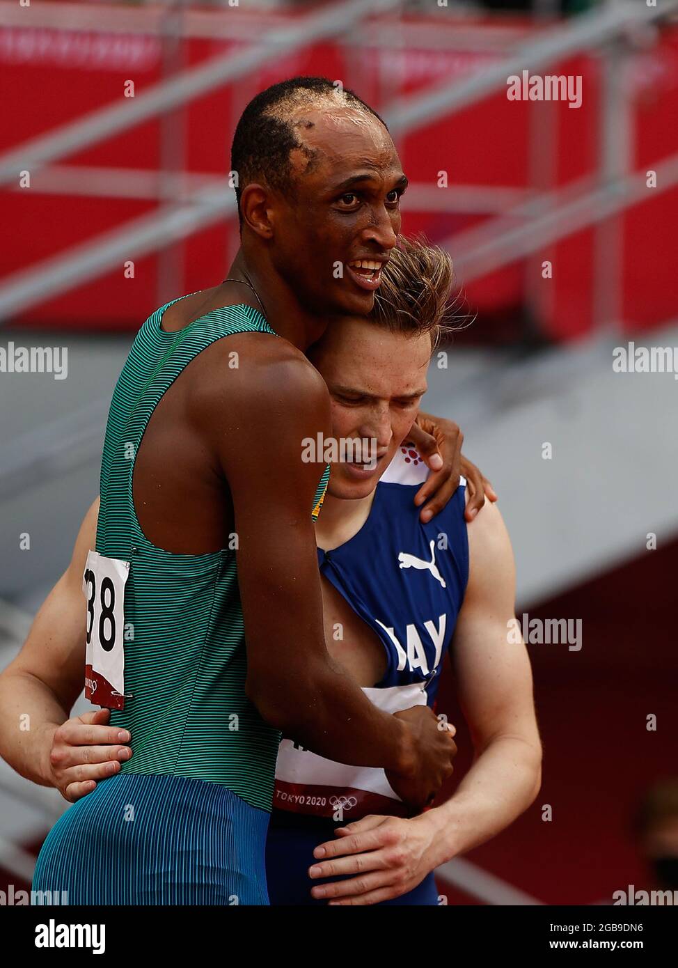 Tokyo, Japan. 3rd Aug, 2021. Karsten Warholm (R) of Norway and Alison ...