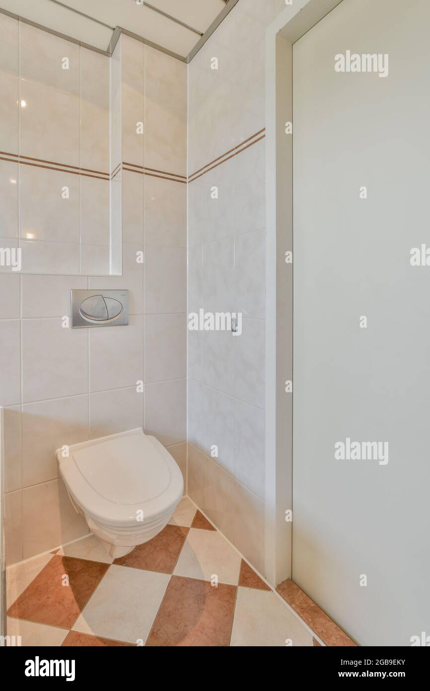 Interior of small clean washroom in miniature style Stock Photo - Alamy