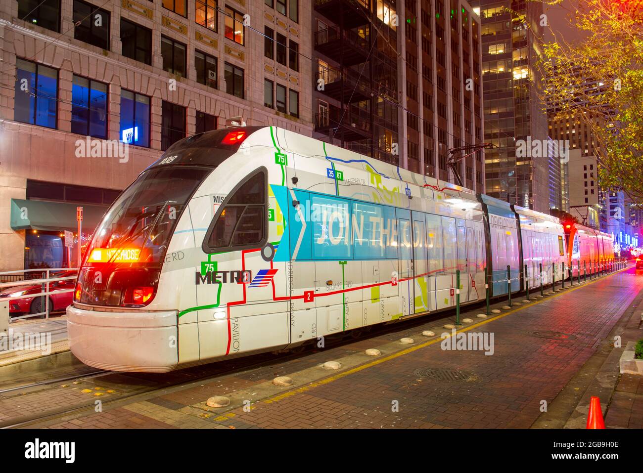 Houston METRORail cars at Main Street Square at night in downtown ...