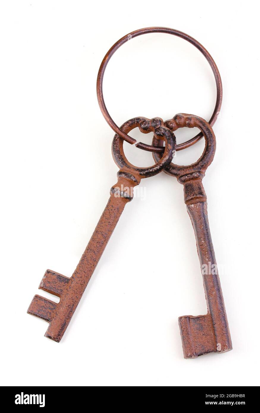 a bunch of antique keys isolated on white Stock Photo - Alamy