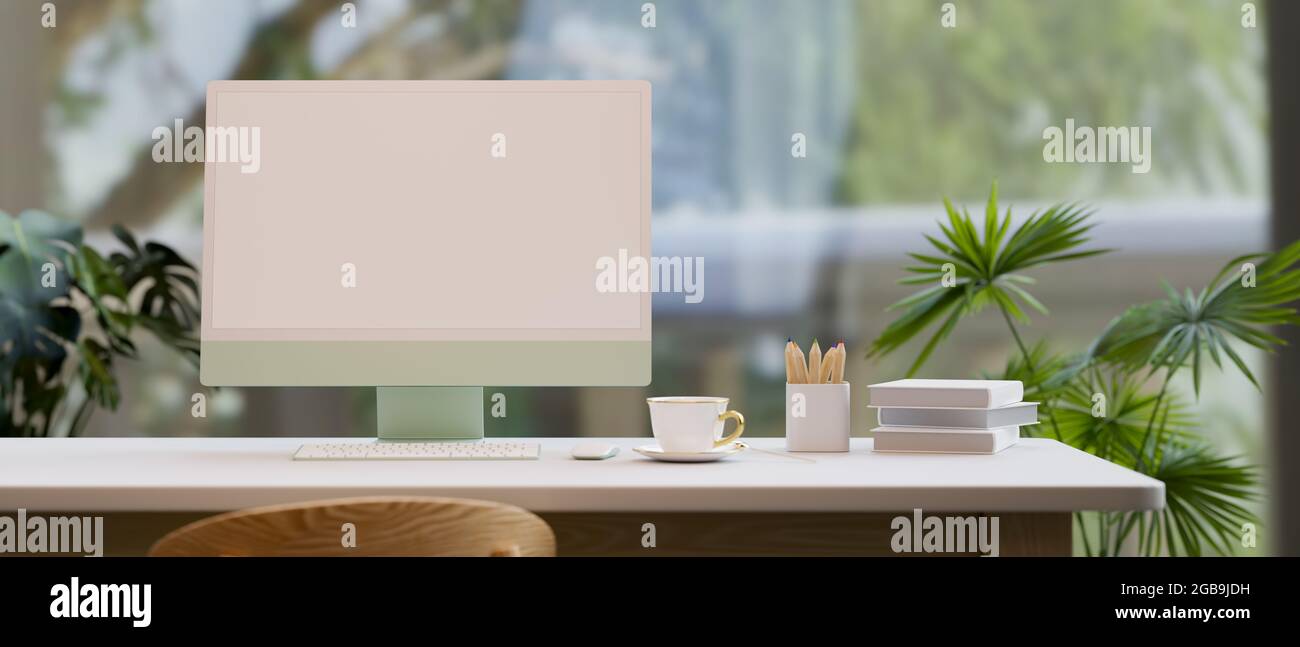 Workspace with natural greenery view outdoor through wide window ...
