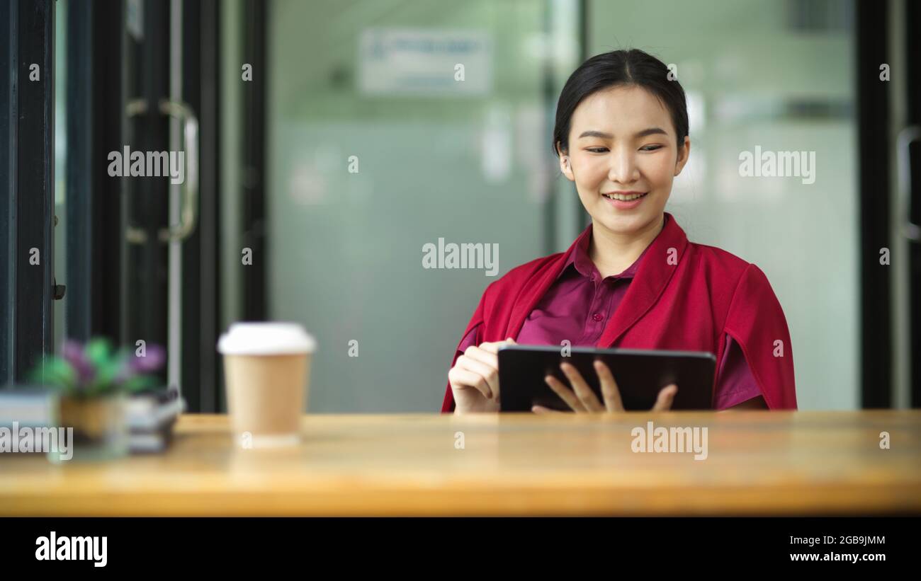 Business female, Chief executive officer sitting and reading business ...