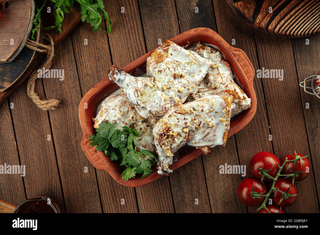 Georgian dish chkmeruli chicken with cream Stock Photo - Alamy