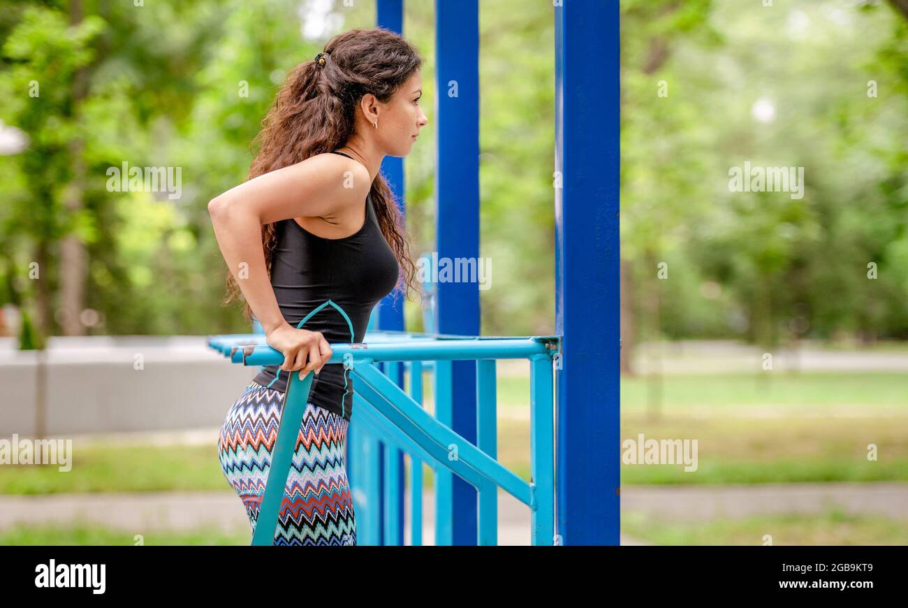 Girl exercising outdoors Stock Photo - Alamy