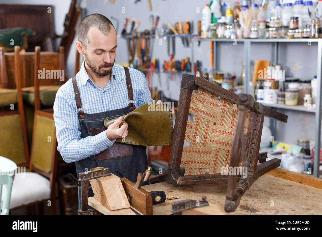 Craftsman using carpentry tools for restoration Stock Photo - Alamy