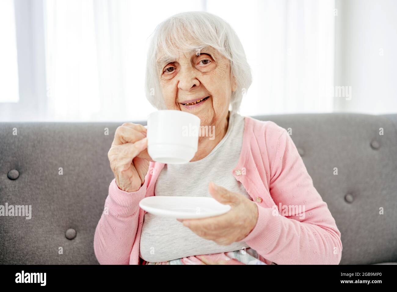 Elderly person drinking tea hi-res stock photography and images - Alamy