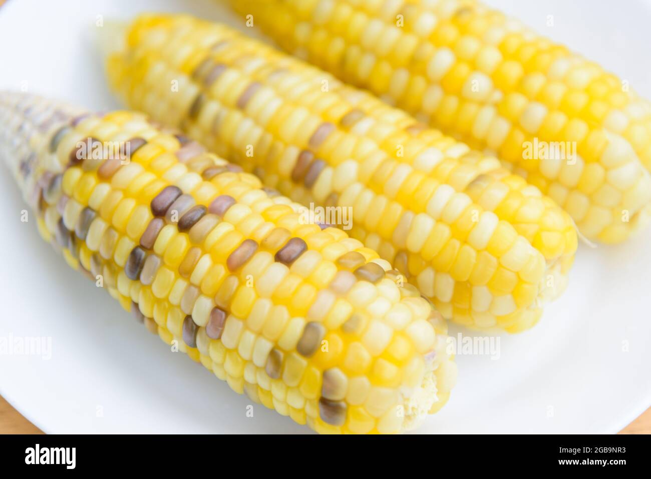 Boiled white corn kernels hi-res stock photography and images - Alamy