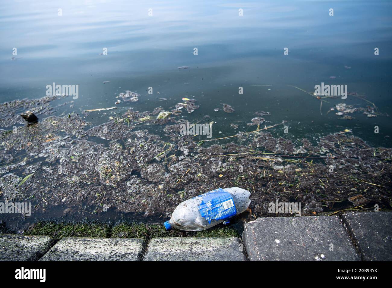 Flotsam plastic pollution floating on hi-res stock photography and ...