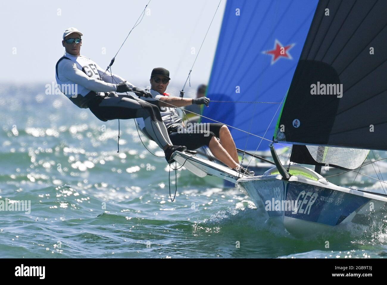 Kanagawa, Japan. 3rd Aug, 2021. Thomas Ploessel (L) and Erik Heil of ...