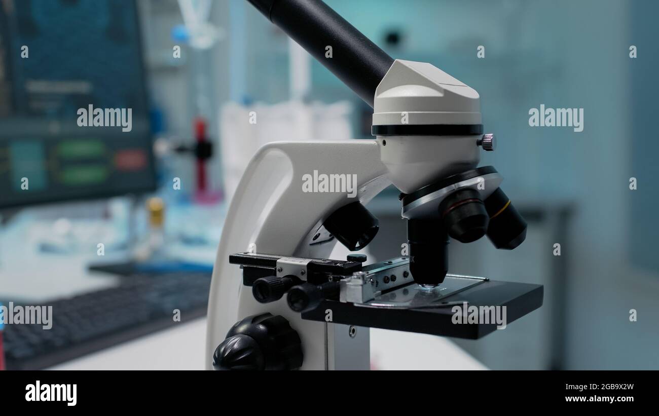 Close up of scientific microscope in laboratory using optical lens with ...