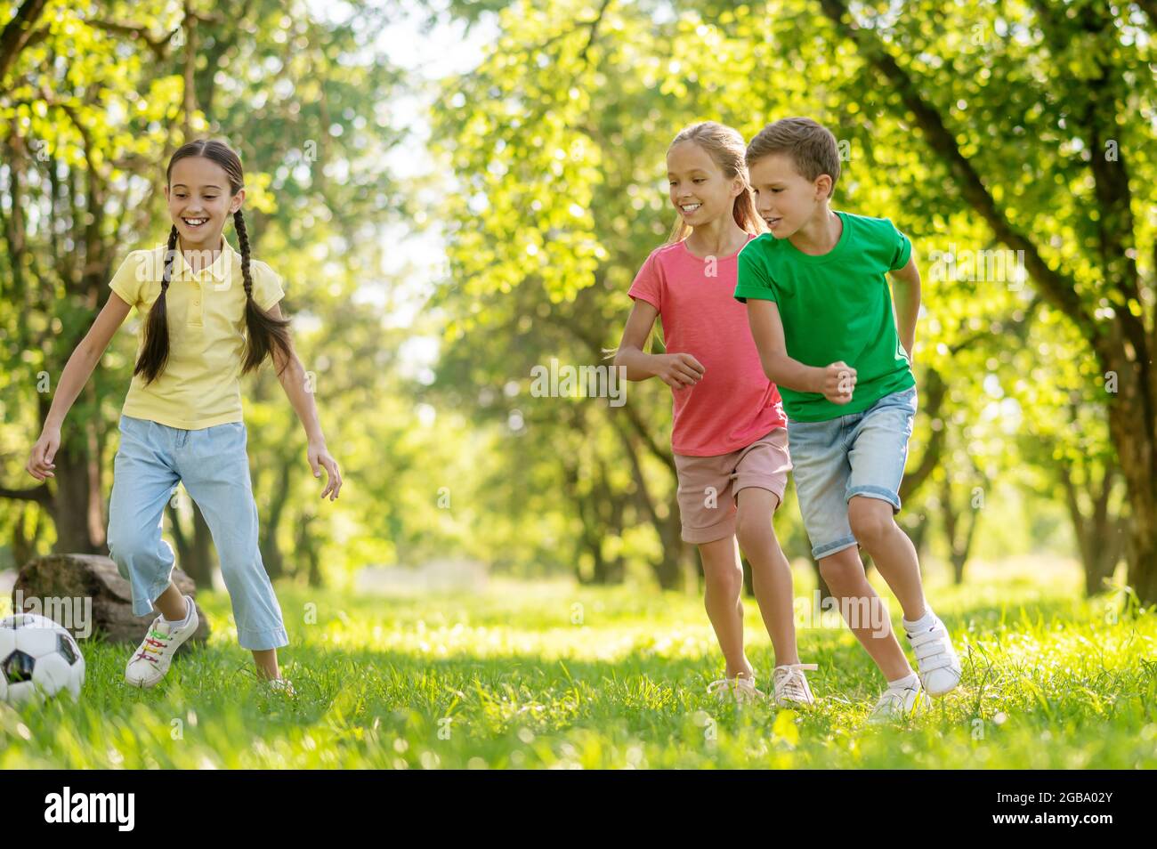 Boy chasing girl hi-res stock photography and images - Alamy
