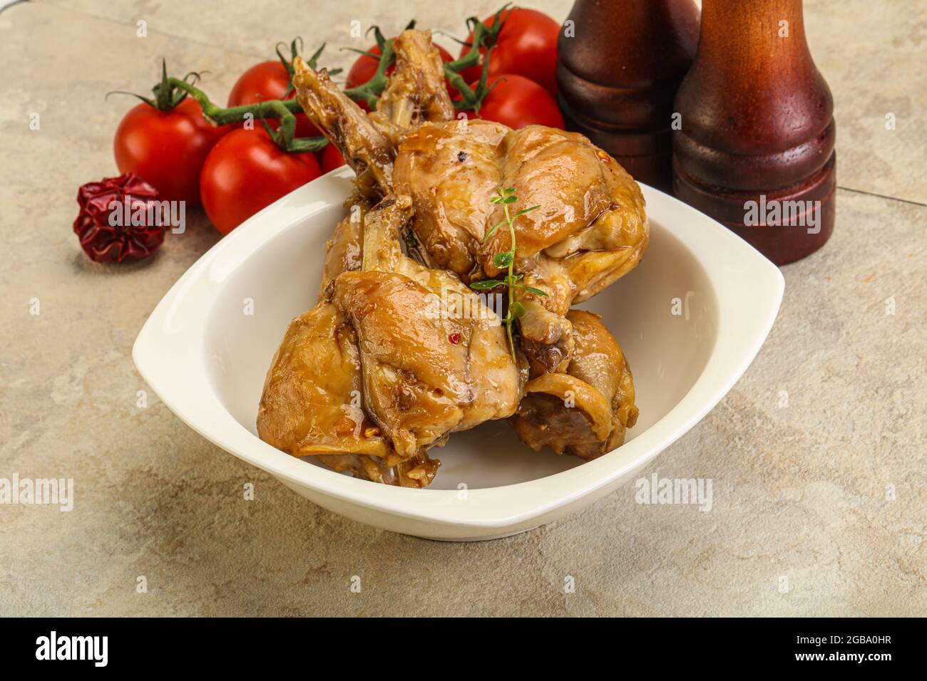 Rabbit stew in sweet and spicy sauce Stock Photo - Alamy