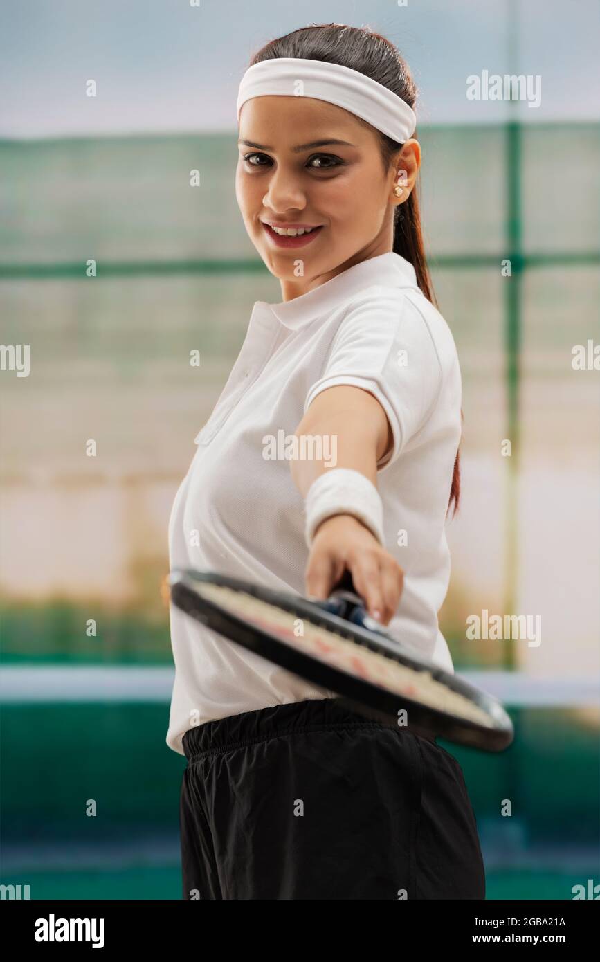 PORTRAIT OF A HAPPY TENNIS PLAYER POSING Stock Photo - Alamy