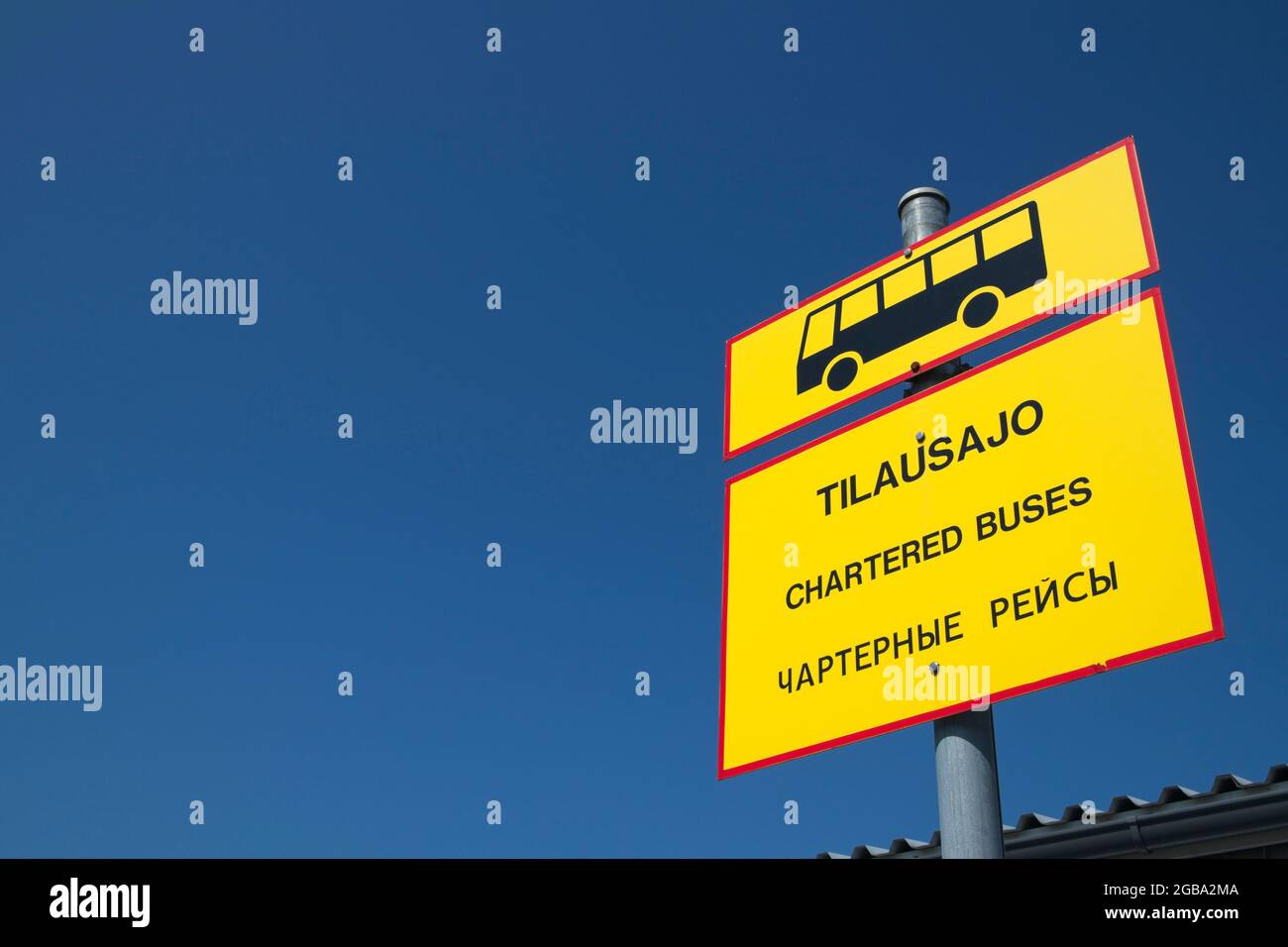 charter bus traffic sign with Finnish, English and Russian text Stock ...