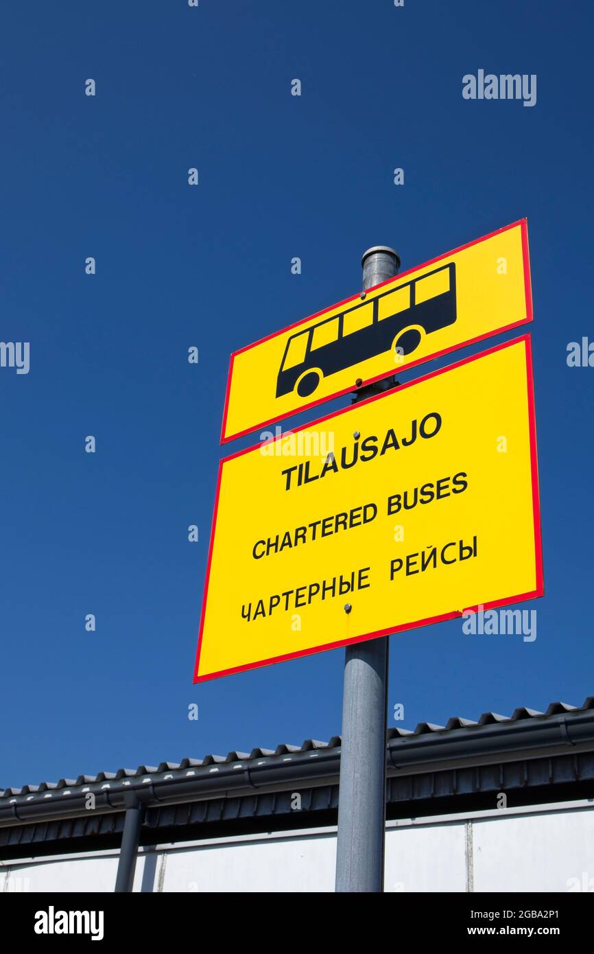 charter bus traffic sign with Finnish, English and Russian text Stock ...