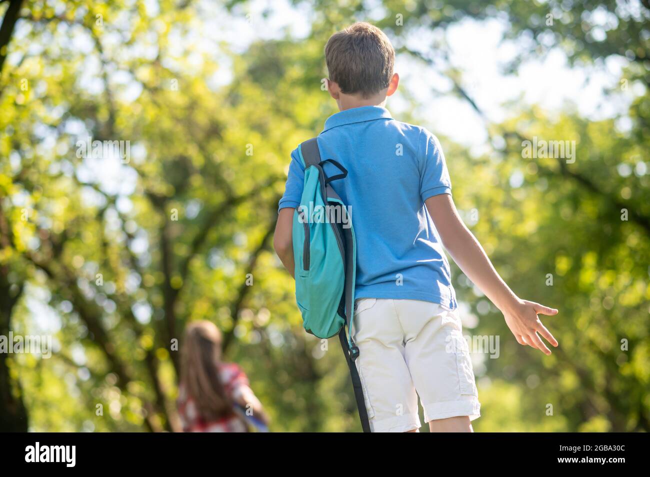 Back view of boy hi-res stock photography and images - Alamy