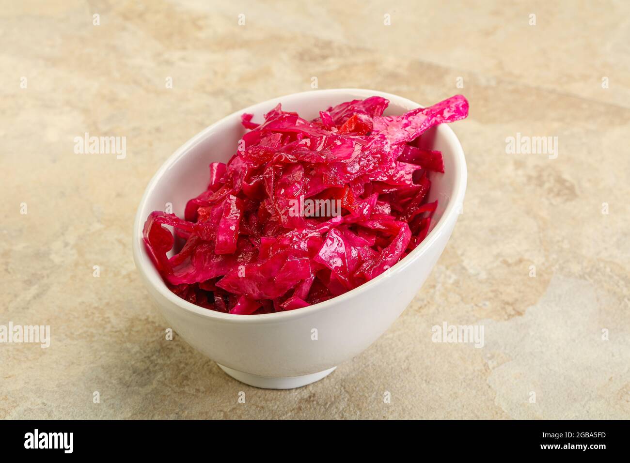Marinated red cabbage with beetroot in the bowl Stock Photo - Alamy