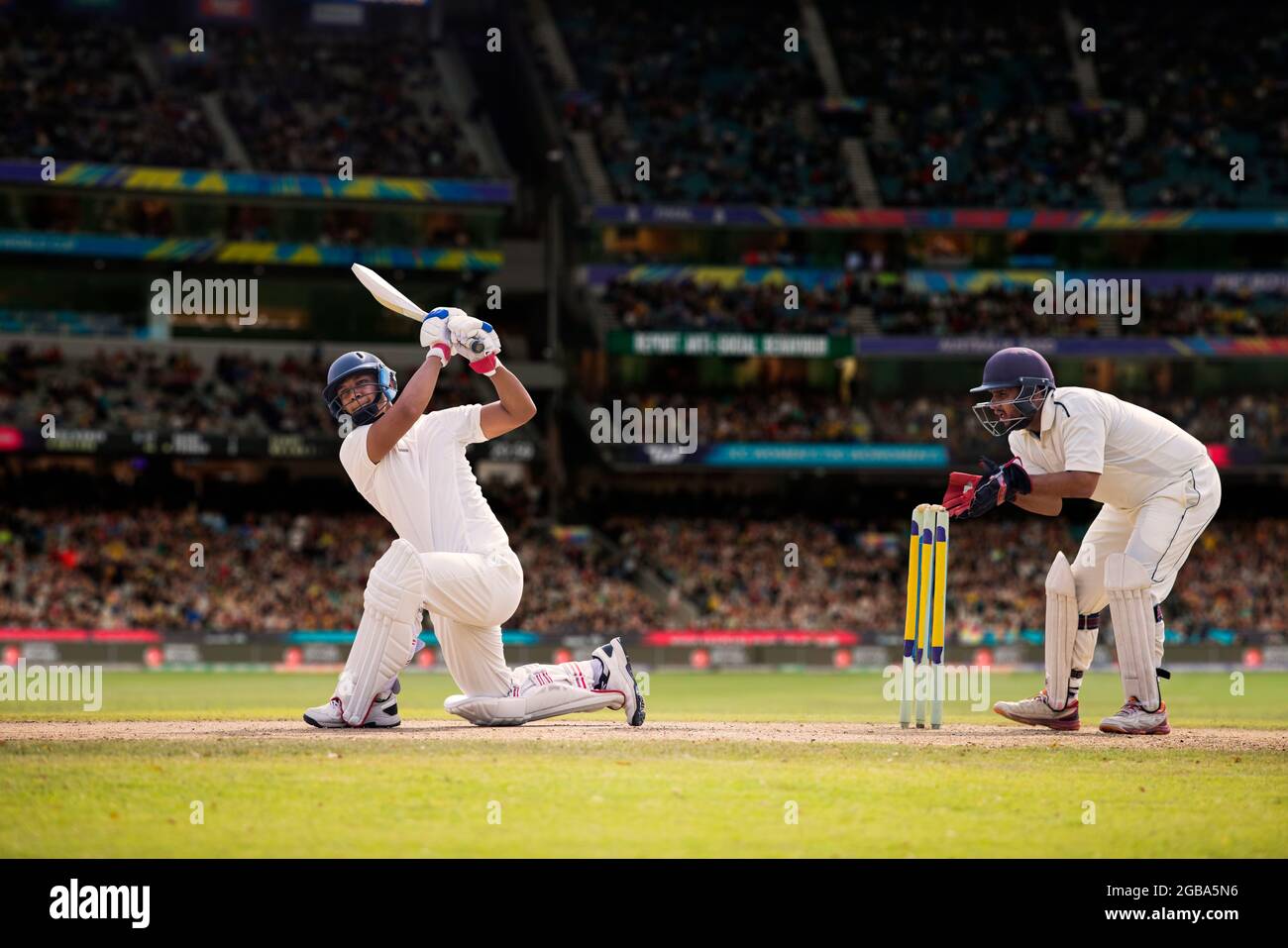 Cricket batsman hitting shot hi-res stock photography and images - Alamy