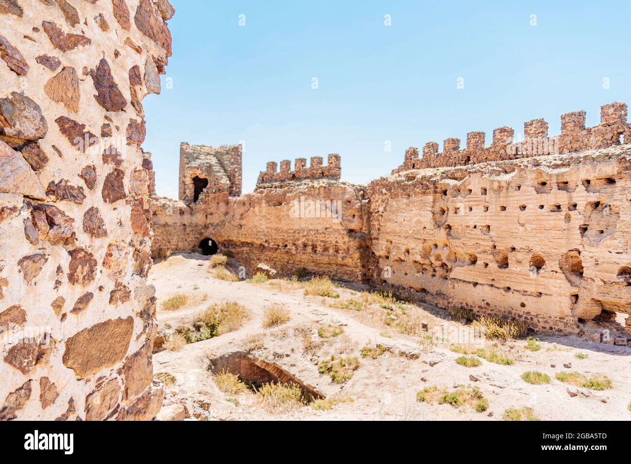 Ancient stone walls of a restored medieval castle Stock Photo - Alamy