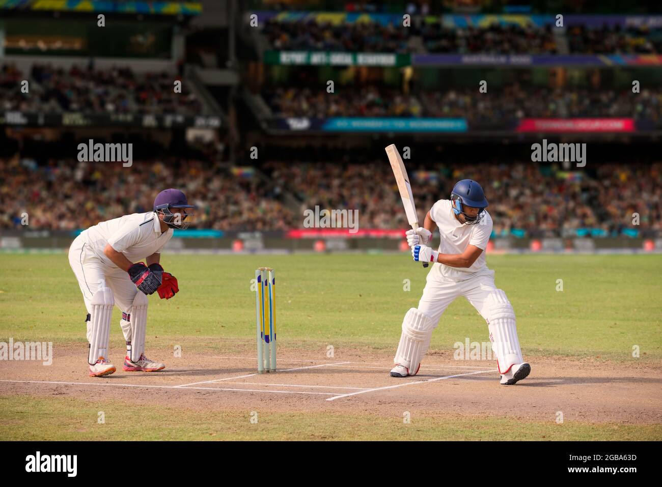 Cricketer batsman ready to hit a shot during a match on the pitch Stock ...