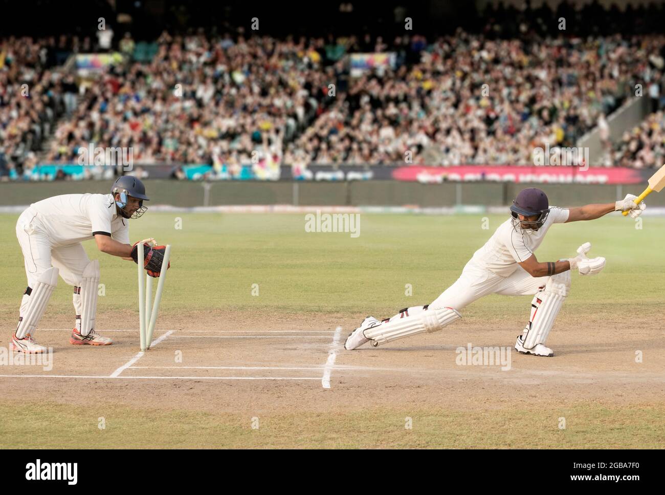 Batsman is Stumped by Wicket Keeper During a match in the stadium Stock ...