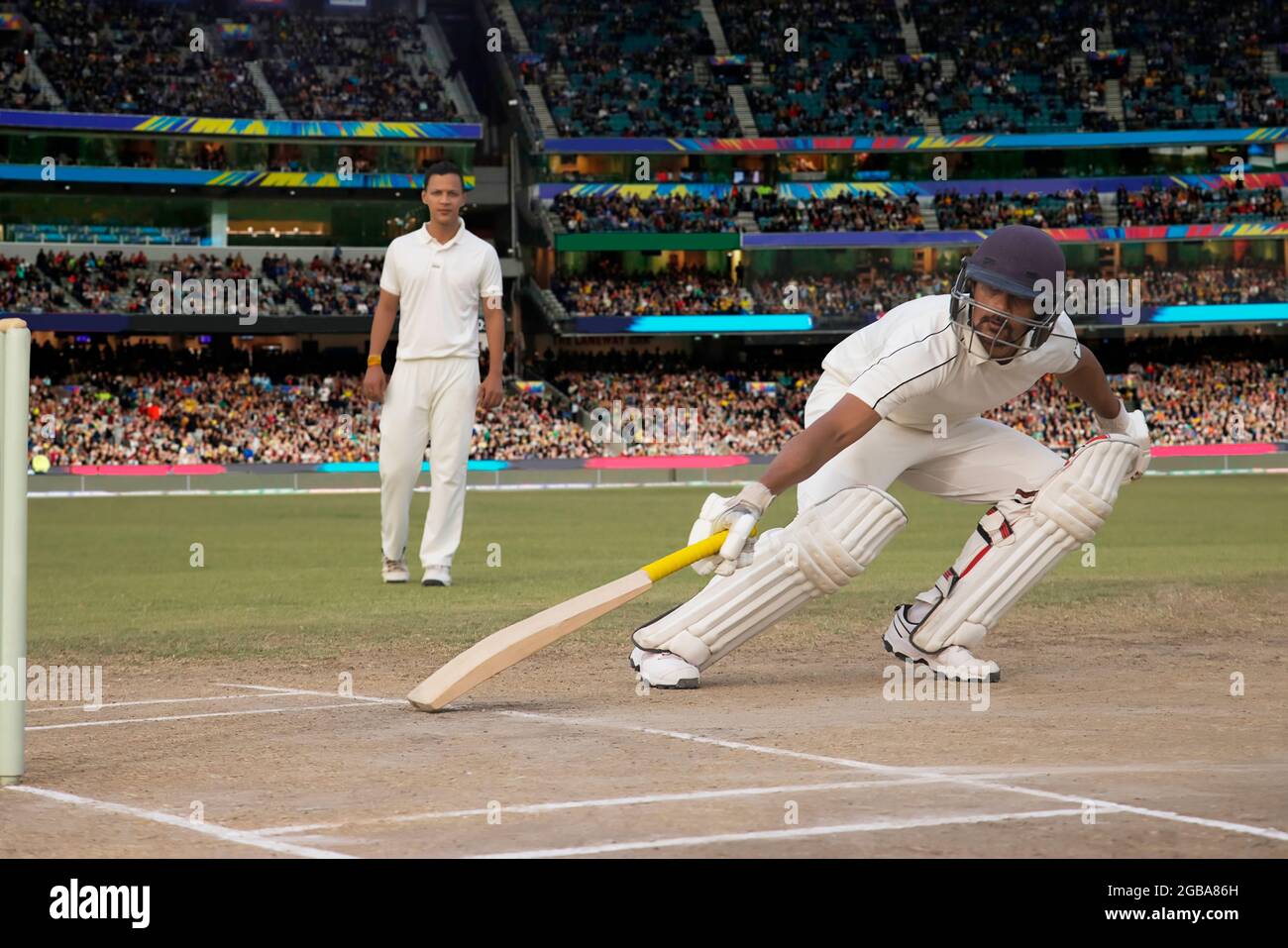 Batsman reaching for the crease while taking a run Stock Photo - Alamy