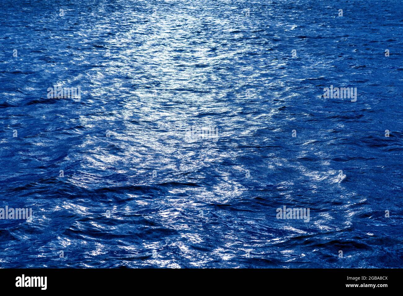 Water Waves Background. Blue Tones Water Surface. Blue sunny sea water ...