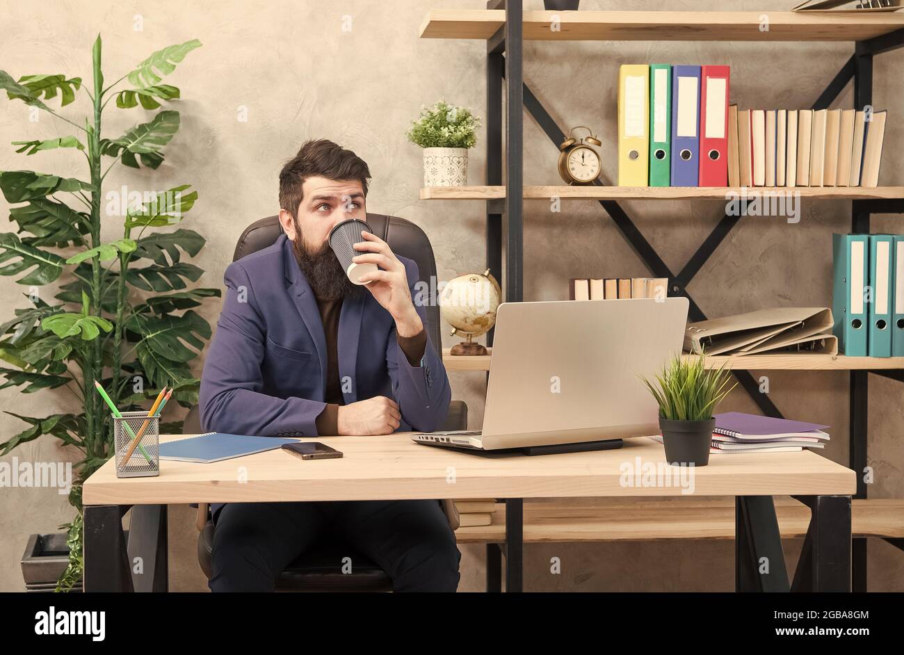 May your coffee be strong and your Monday be short. Businessman drink ...