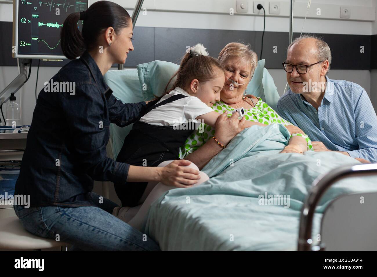 Close-up of granddaughter supporting grandmother hugging her during ...