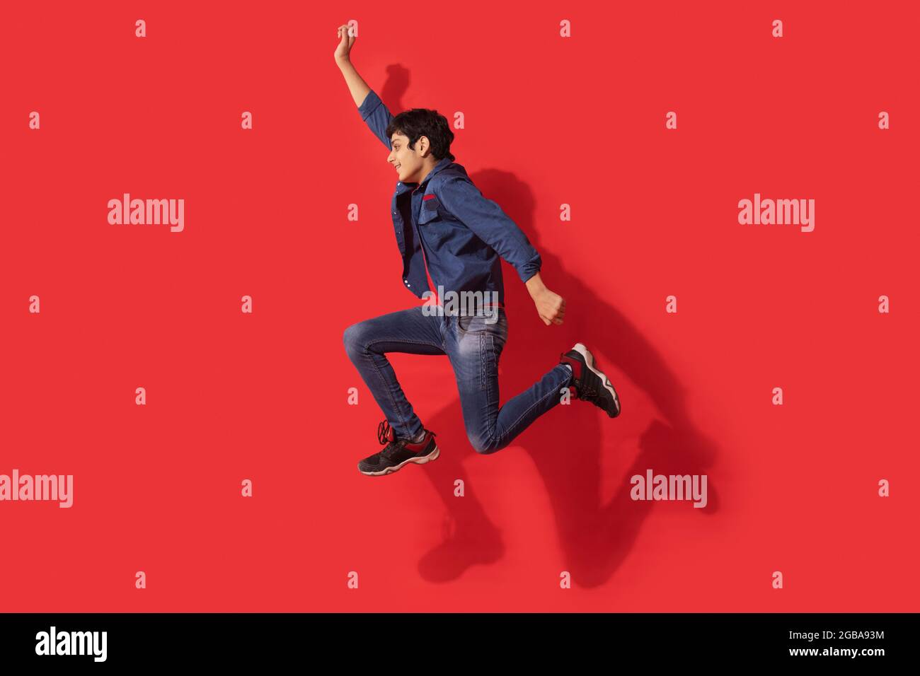 A HAPPY TEENAGER JUMPING IN EXCITEMENT Stock Photo - Alamy