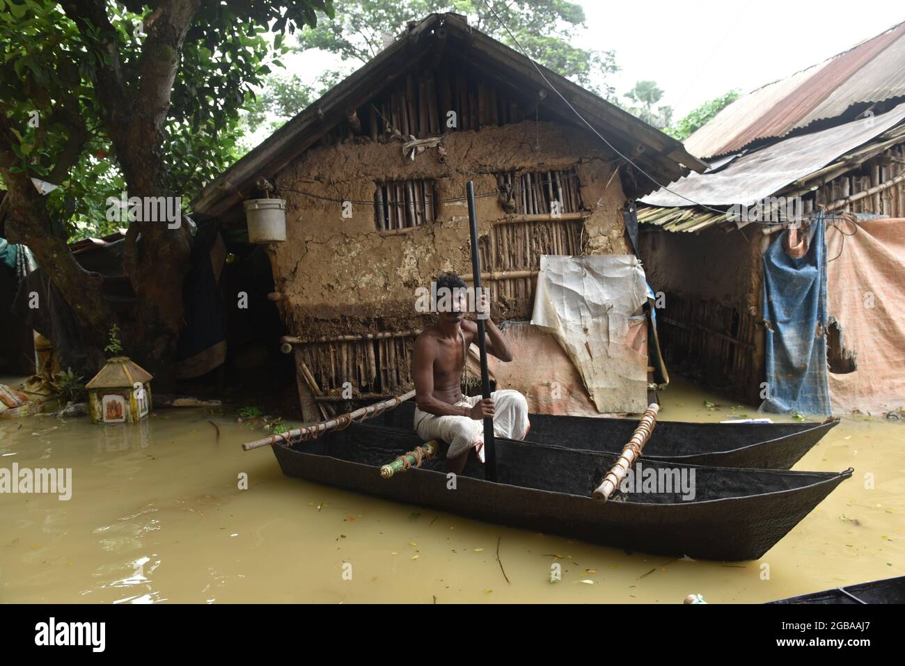 Ghatal, India. 02nd Aug, 2021. People use boat to commute in the Ghatal ...