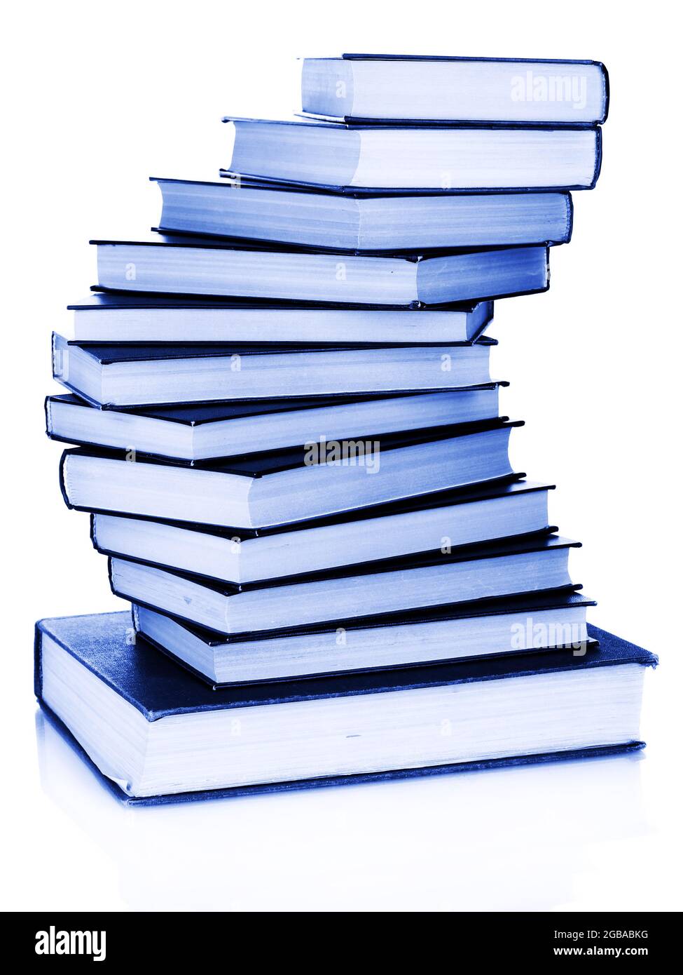 Stack of books in blue light Stock Photo - Alamy
