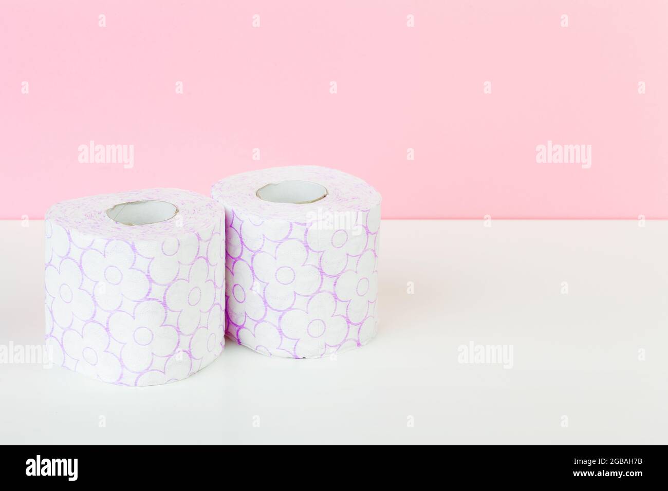 Roll of toilet paper or tissue on color background Stock Photo - Alamy
