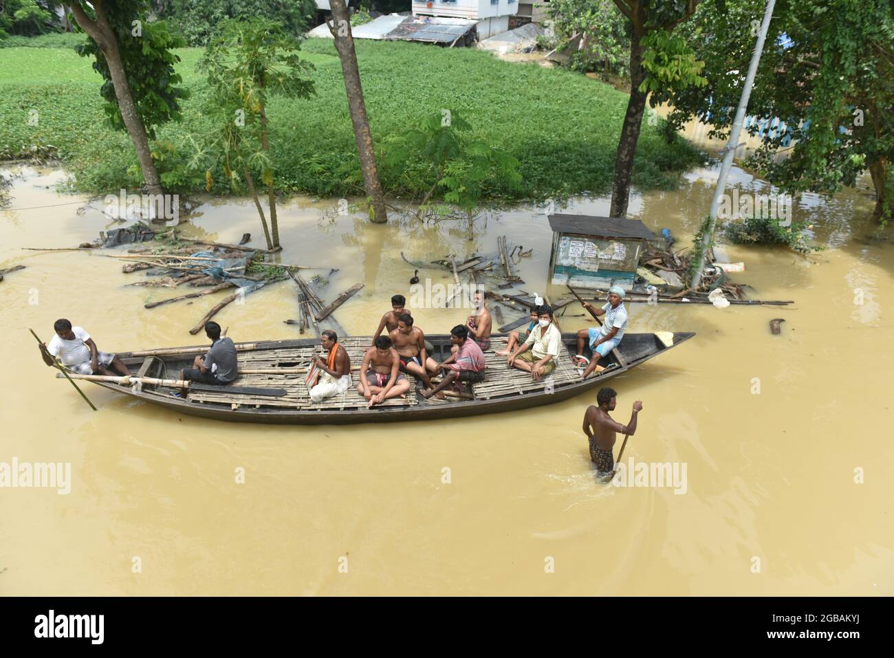 People use boat to commute in the Ghatal area of Paschim Medinipur district. The region is ...