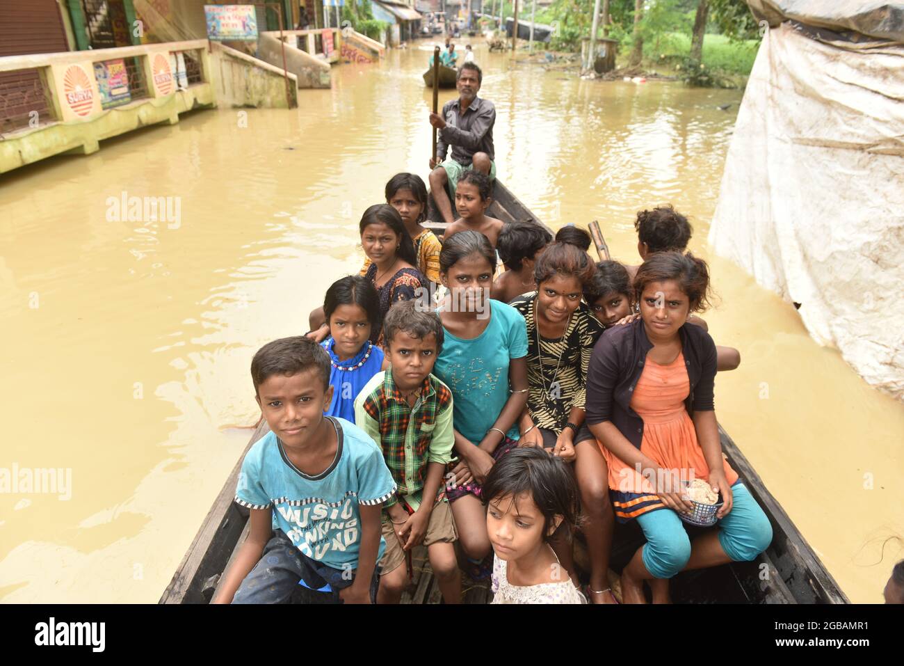People use boat to commute in the Ghatal area of Paschim Medinipur ...