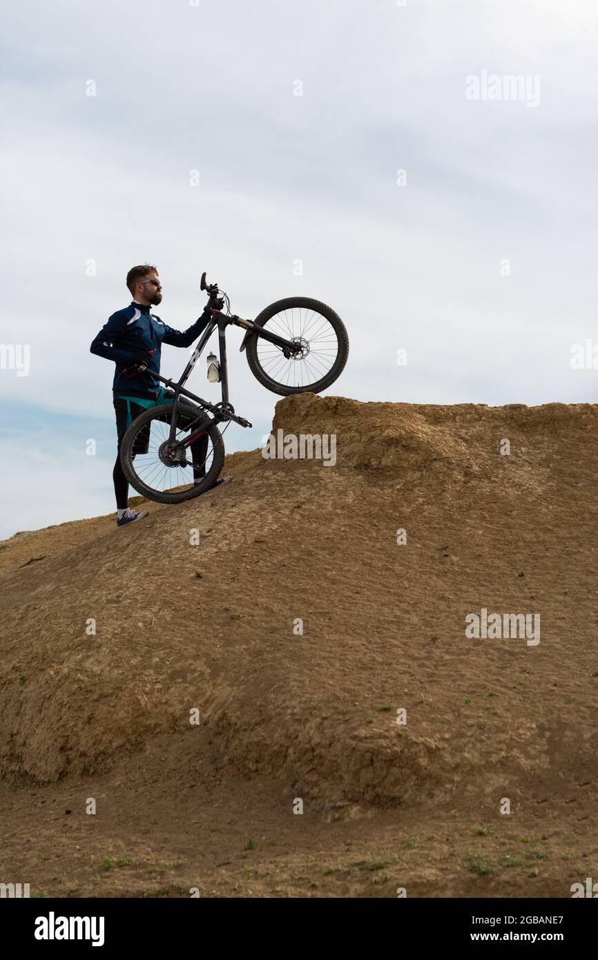 Bearded mountain bicyclist rides hi-res stock photography and images ...