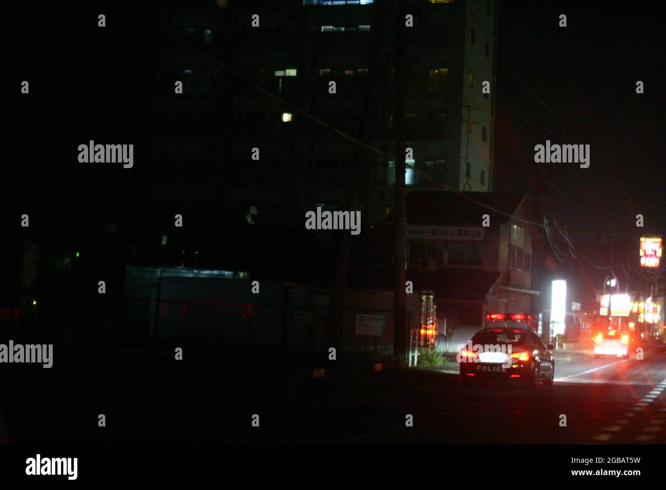 Cop Car in Japan at Night Stock Photo - Alamy