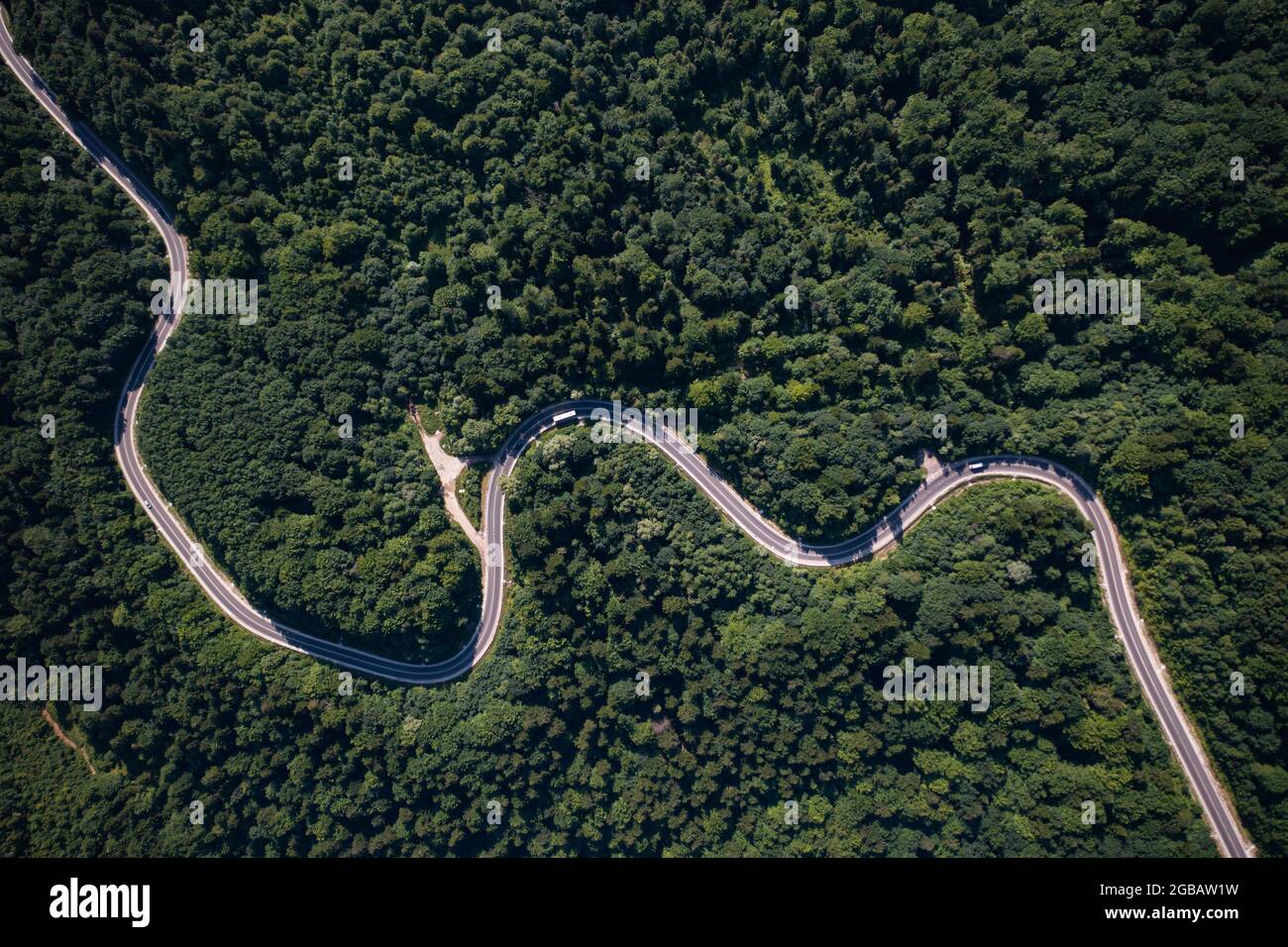 Aerial view on mountain road from drone Stock Photo - Alamy