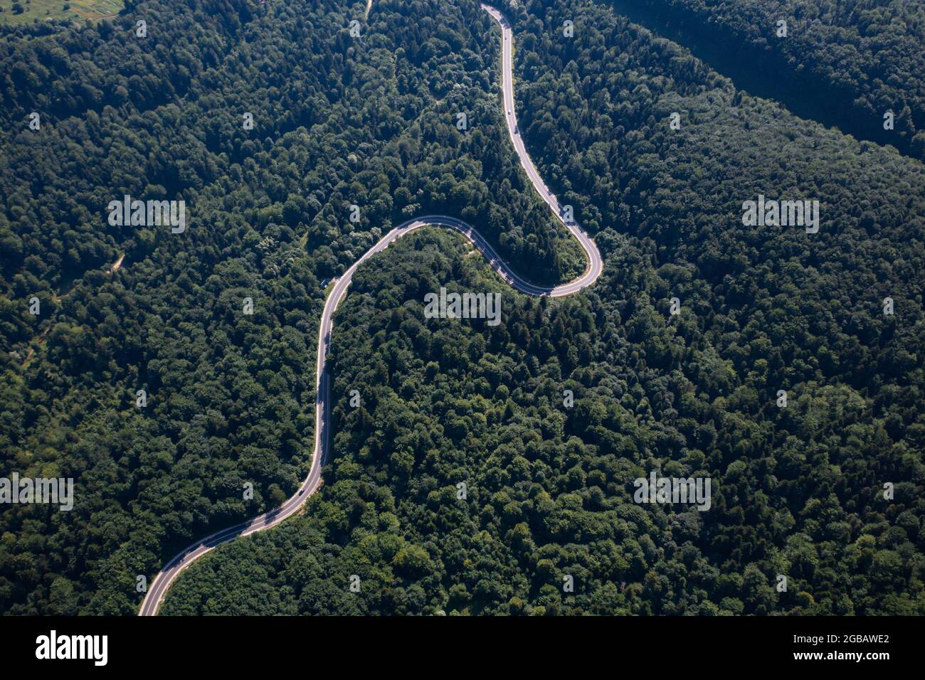 Aerial view on mountain road from drone Stock Photo - Alamy