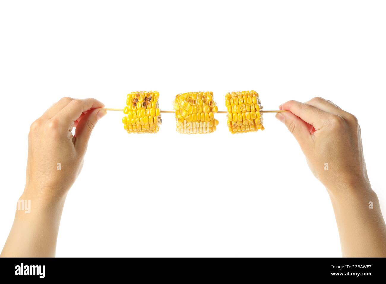 Female hands hold grilled corn, isolated on white background Stock ...