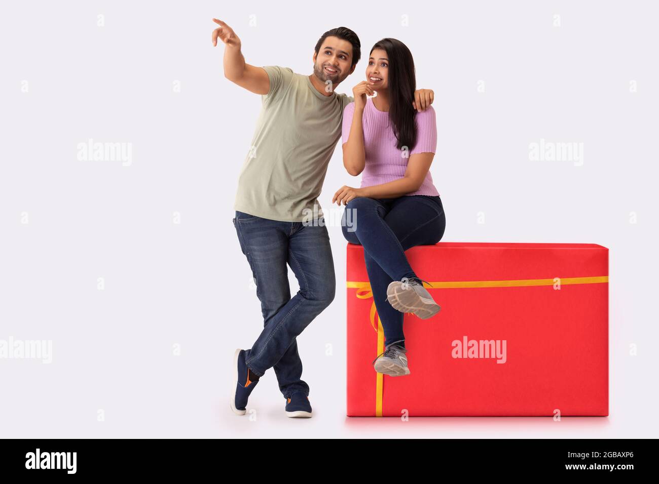 Person sitting on a stool hi-res stock photography and images - Alamy